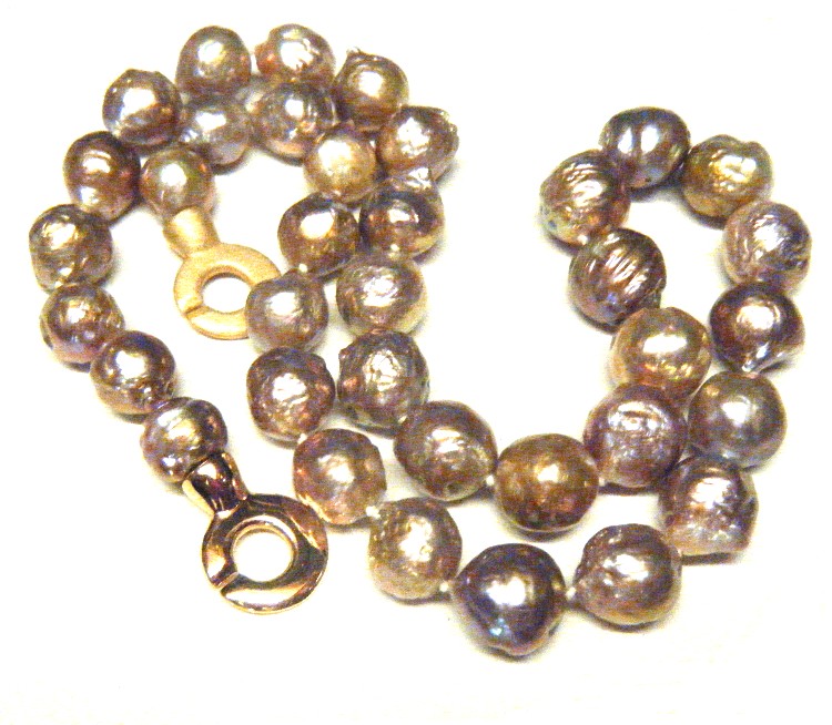 Nacre depth on bead nucleated freshwater pearls - Pearlescence